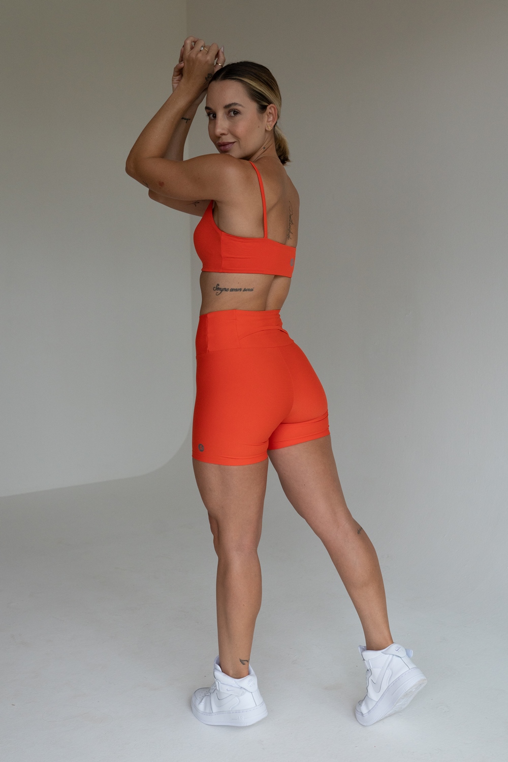 Short Esportivo com bolso laranja - Dama Concept Gym