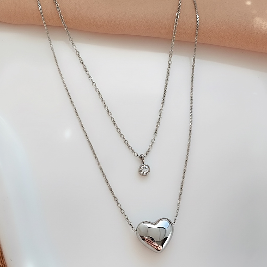 COLAR DUPLO CORAÇÃO E PONTO DE LUZ AÇO 316L⭐️ - Mania de Biju ...