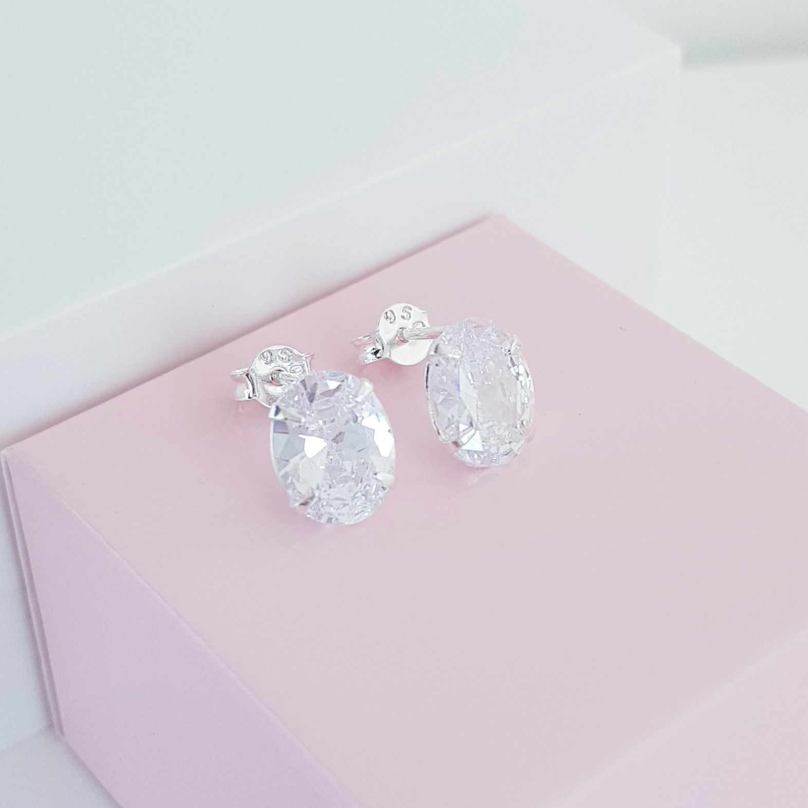 Brinco Ponto de Luz Zirconia 9mm Oval em Prata 925 Rosa Claro Acessóri ...