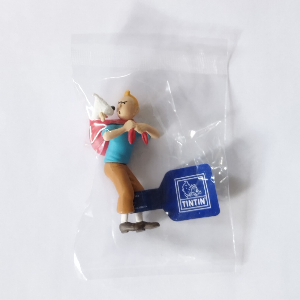 Tintin carrega Milu 8cm - As Aventuras de Tintin - O Templo do Sol - SG ...