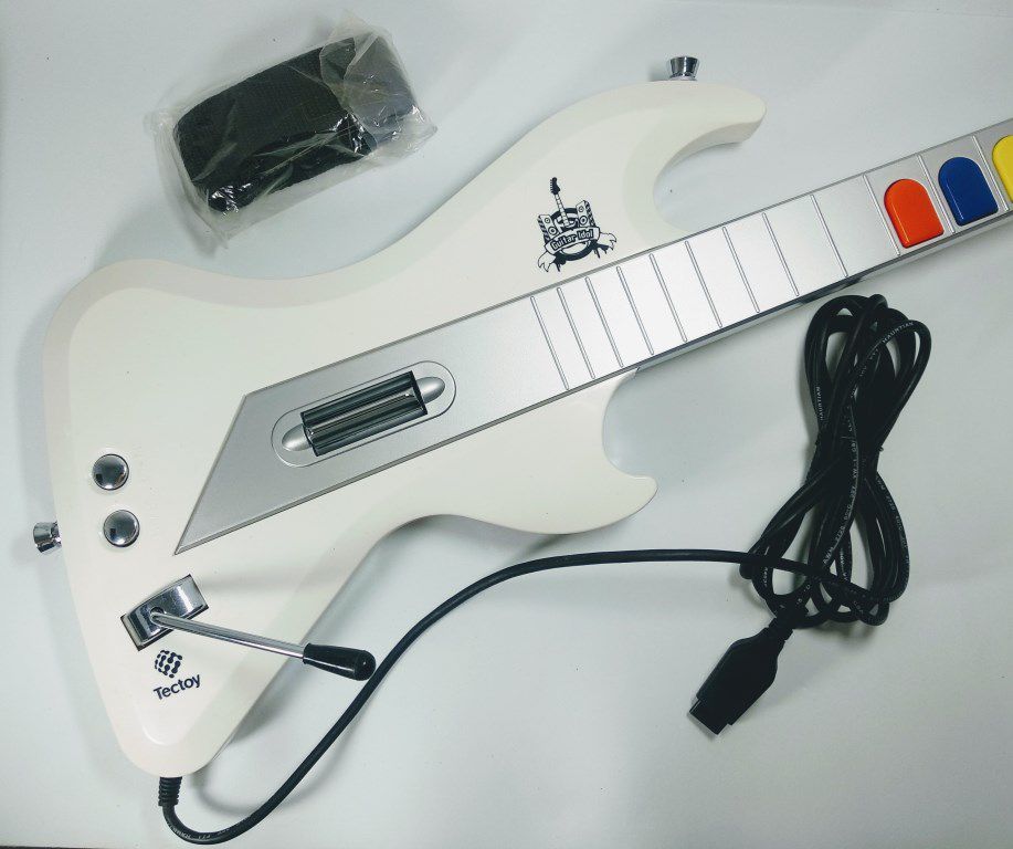 Console Mega Drive 4 Guitar Idol Tectoy (100 jogos) - Sebo dos Games ...