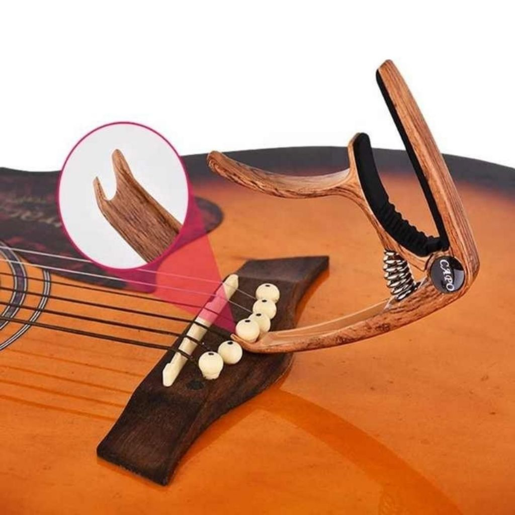 Capotraste Guitar Capo Sc-5 Alumínio Cor de Madeira - Constelação ...