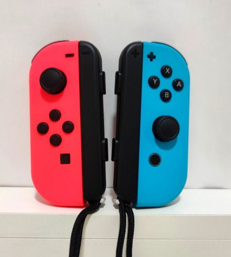Joy Con Neon Red / Neon Blue - Nintendo Switch - Semi-Novo - Carvalho Games