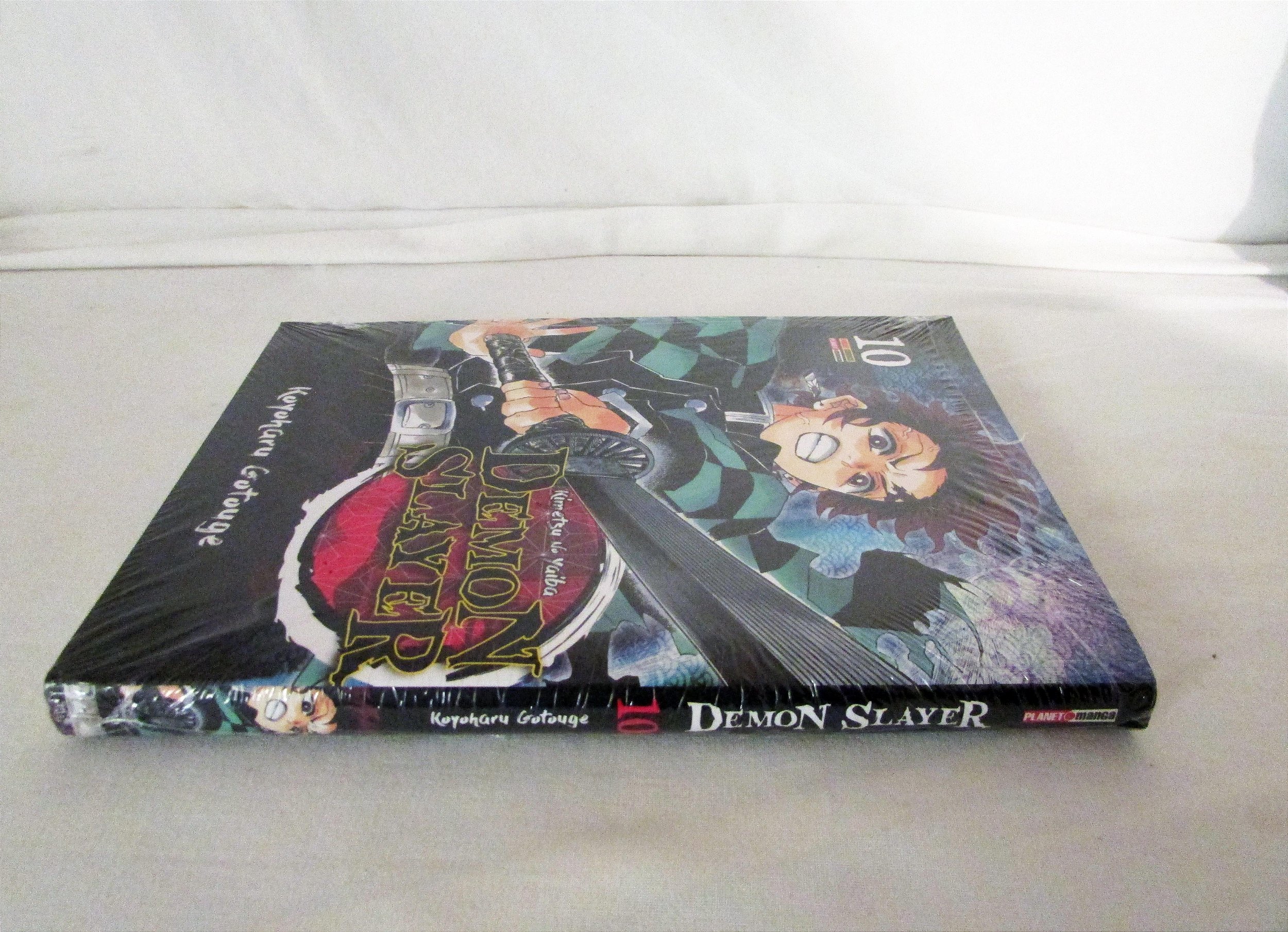 Mangá Demon Slayer: Kimetsu No Yaiba Vol. 10 (Em Português) + 1 Brinde ...