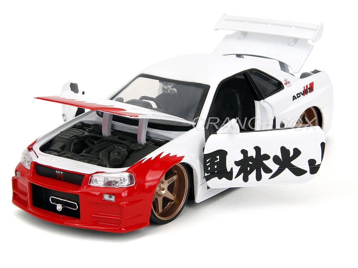 Nissan Skyline GT-R (R34) 2002 Street Fighter + Figura Ryu Jada Toys 1: ...