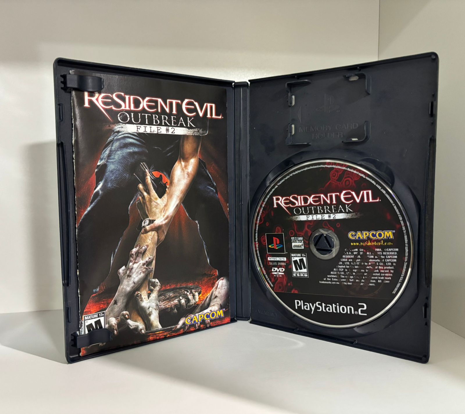 Resident Evil Outbreak File 2 PS2 Original Americano (Usado) - www.maicongames.com.br