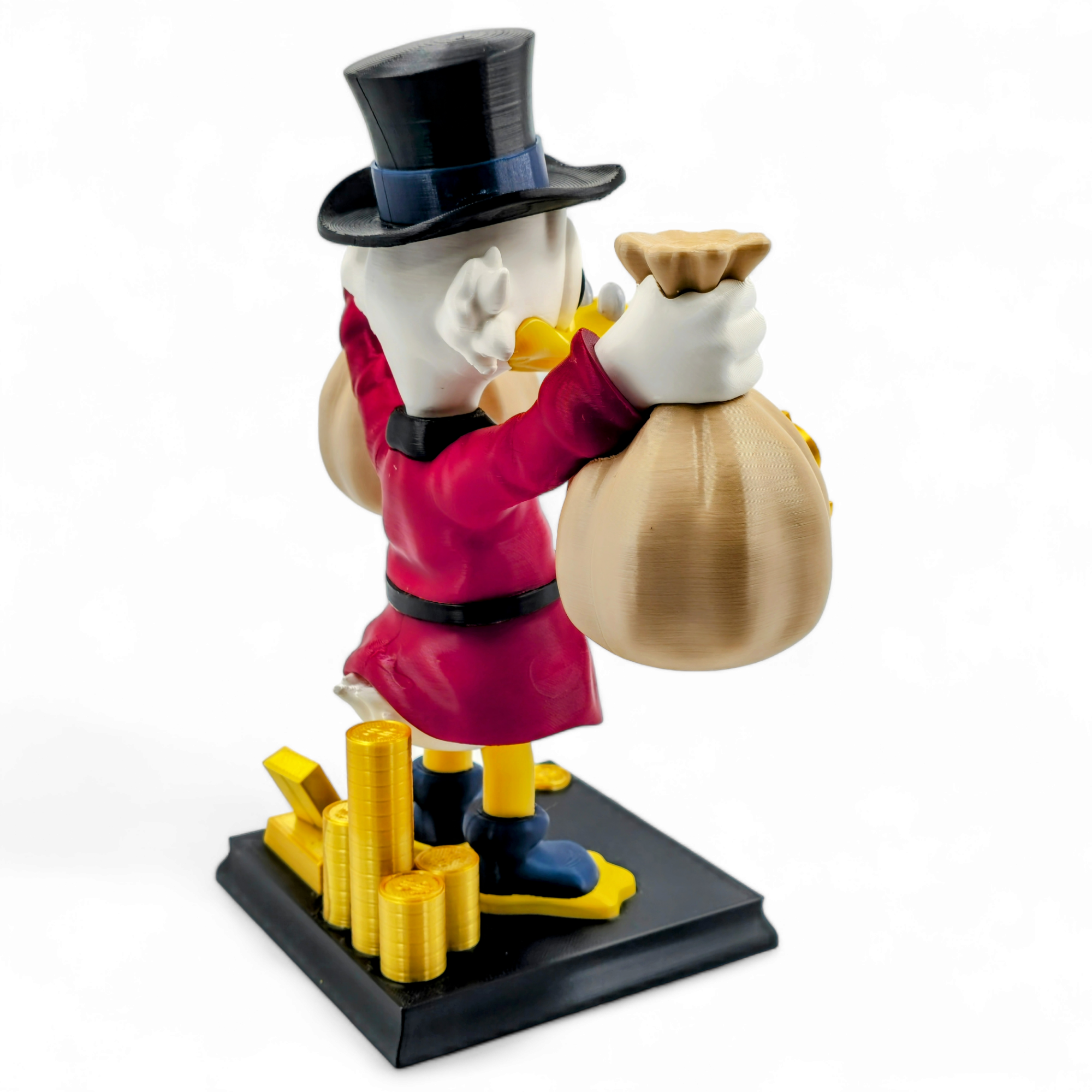 Tio Patinhas Segurando Sacos de Dinheiro 20cm: Tio Patinhas Muito Rico ...