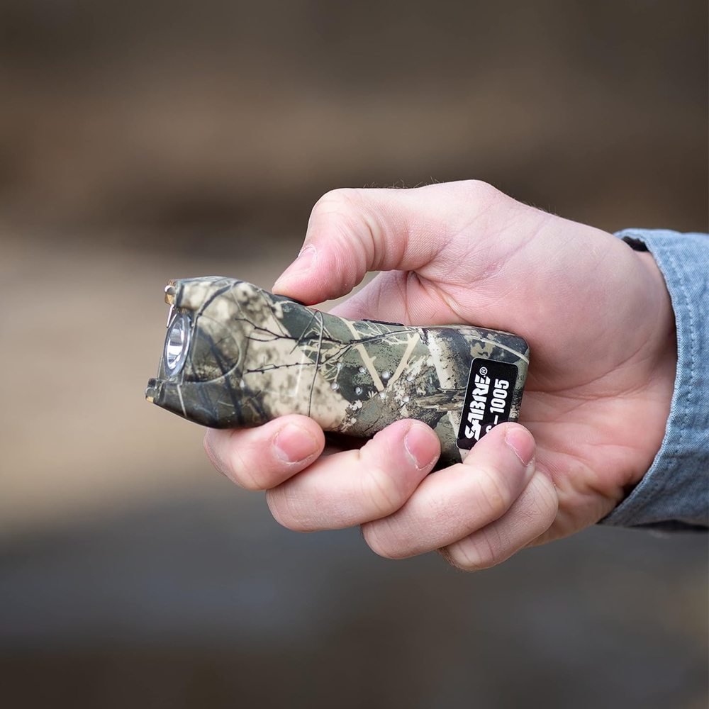 Arma De Choque Sabre S-1005 Taser Defesa Pessoal Original - SPRAY DE ...