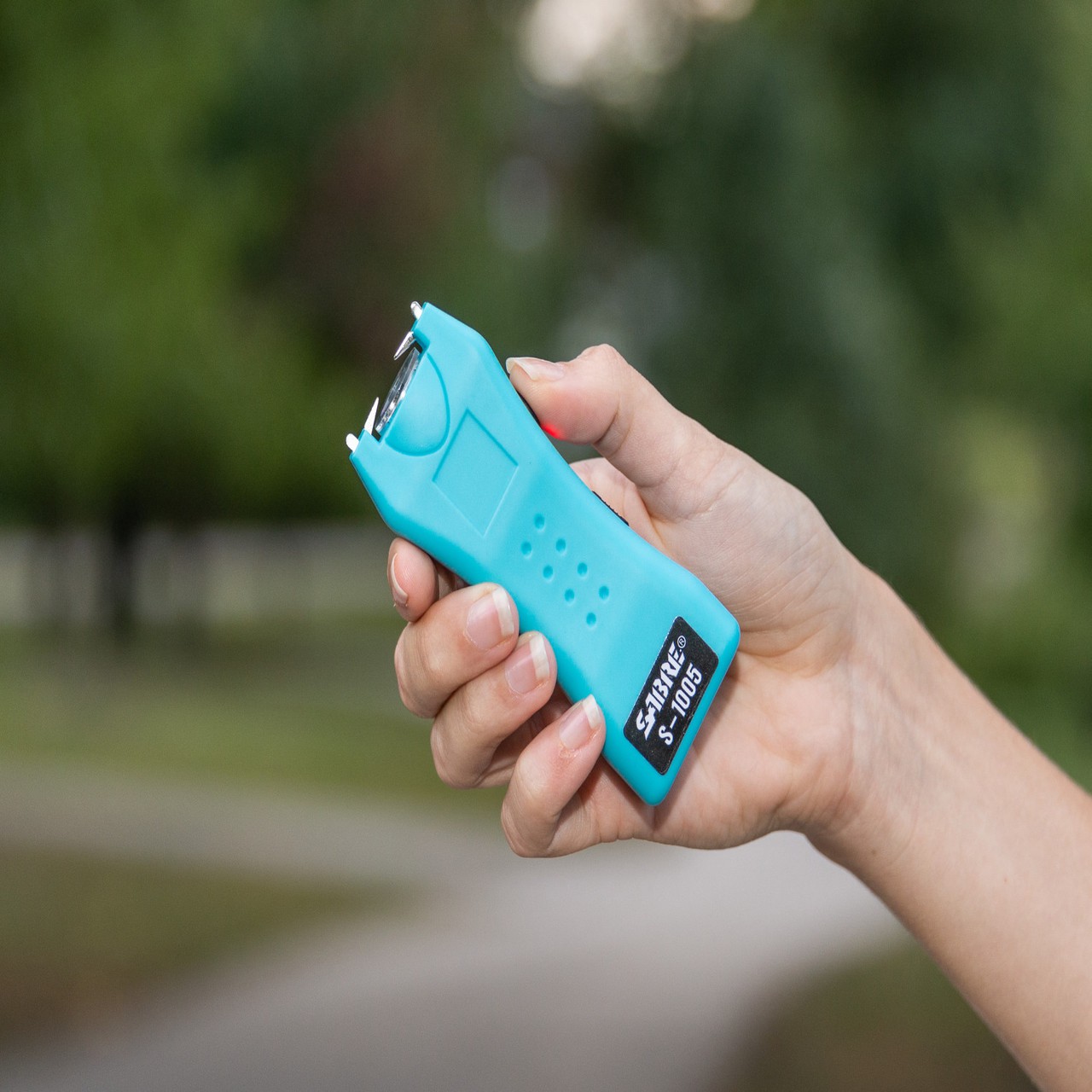 Arma De Choque Sabre S-1005 Taser Defesa Pessoal Original - SPRAY DE ...