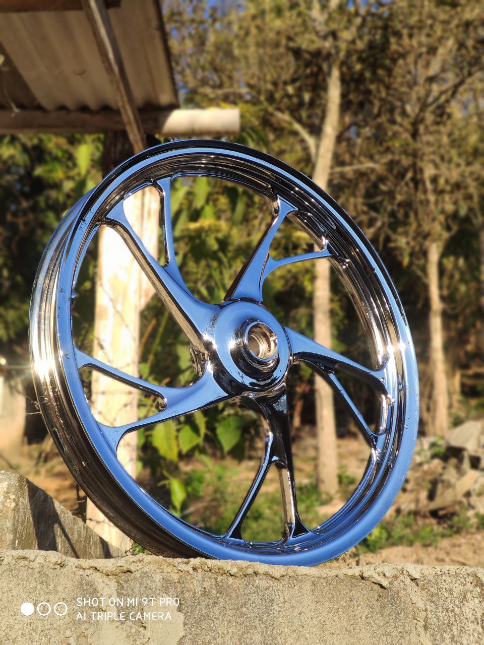 RODA CROMADA HONDA CG 160 TITAN PÉ DE GALINHA ORIGINAL - ARTECROMO