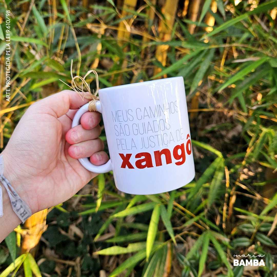 Caneca Orixá Xangô Kaô - Maria Bamba - Camisetas de Umbanda e Candomblé Caneca Orixá Xangô Kaô - Maria Bamba - Camisetas de Umbanda e Candomblé