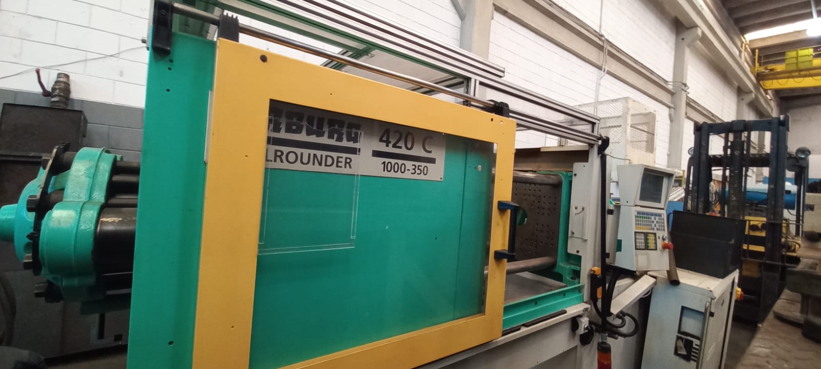 INJETORA DE PLASTICOS ARBURG MODELO 420C 1000-350 - Huck Máquinas