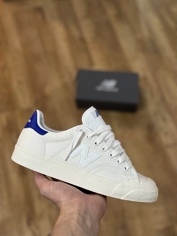 NEW BALANCE BB100 (branco/azul) - Corre de Rua